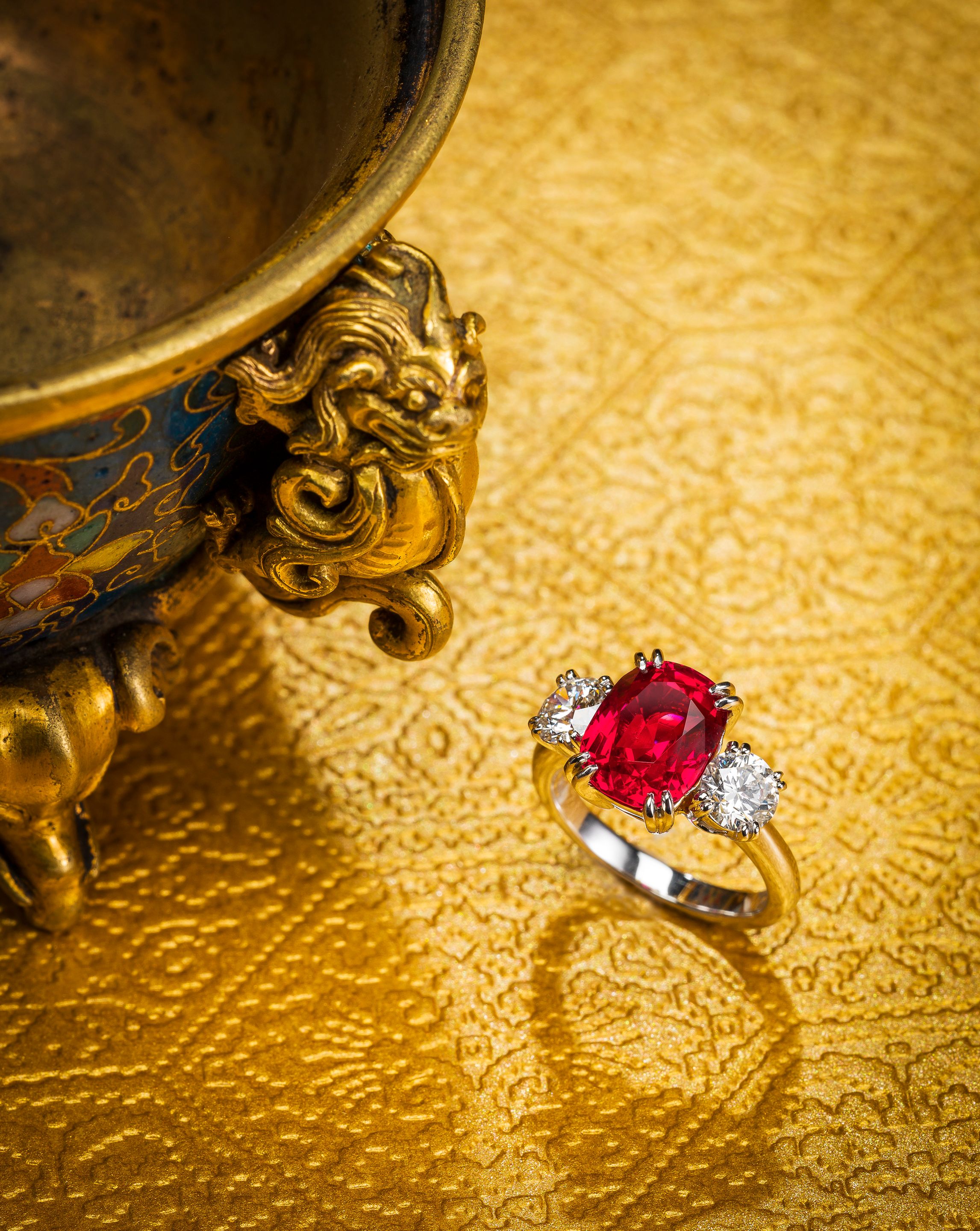 Bonhams : An important ruby and diamond three-stone ring