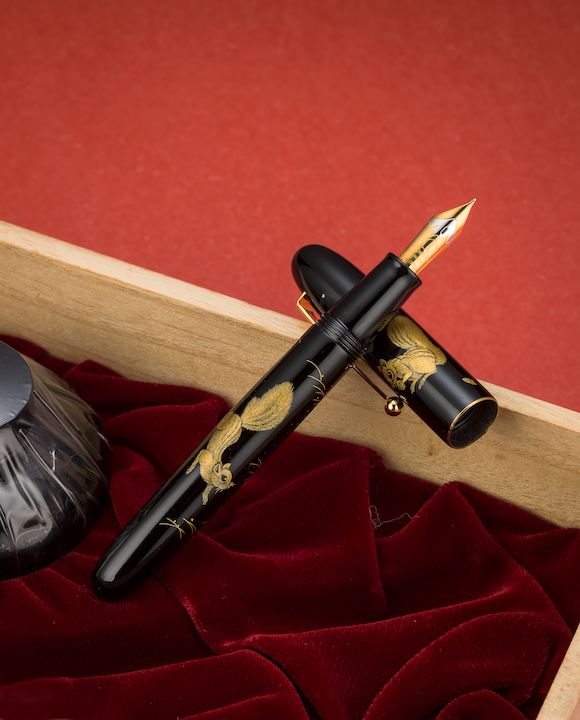 Bonhams : Namiki. A fine Squirrel fountain pen with box and paper ...