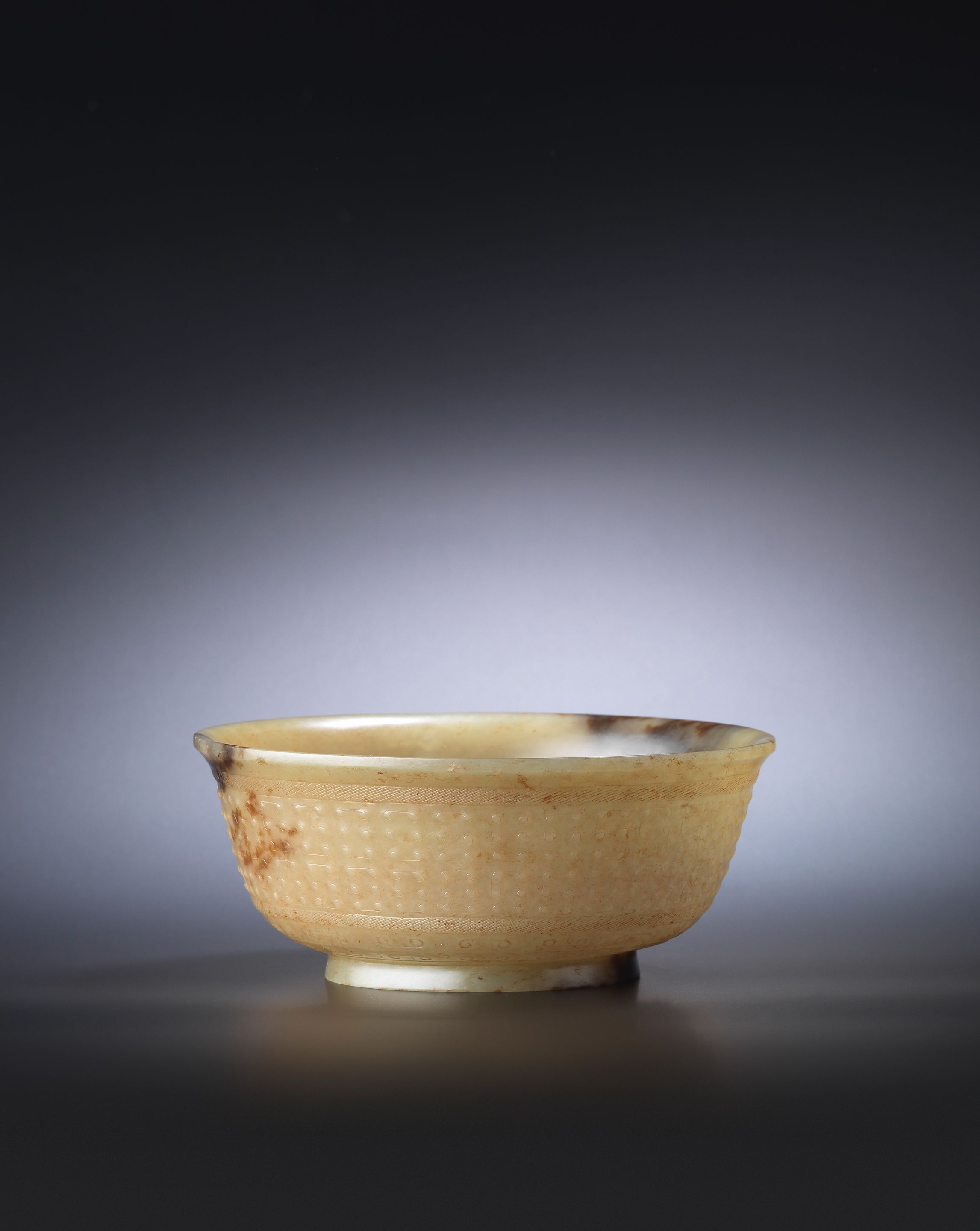Bonhams : A rare yellow and brown archaistic jade bowl Qianlong