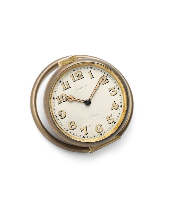Bonhams : A Brass keyless wind travel clock with 8 day power reserve ...
