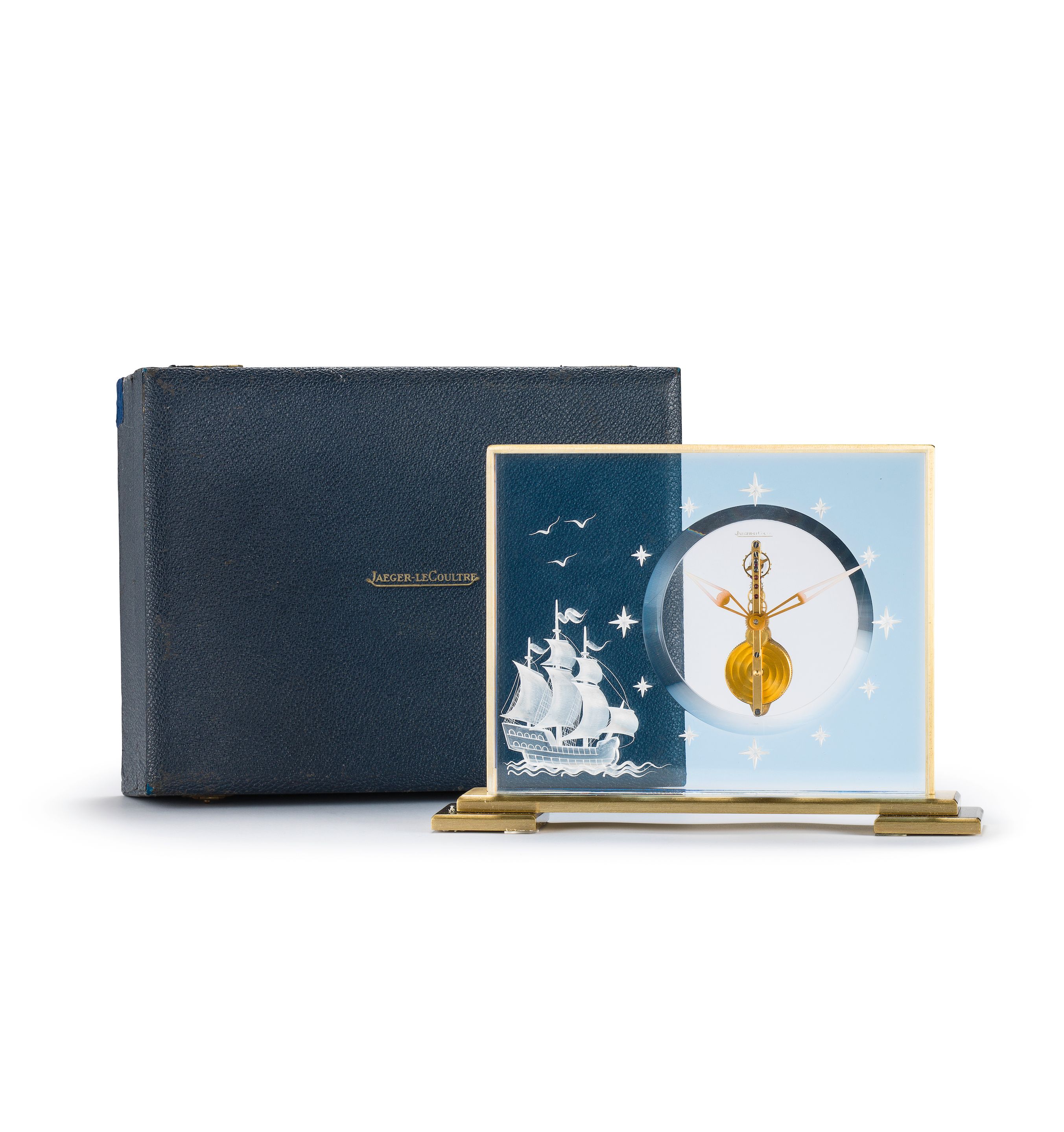 Bonhams : Jaeger-Lecoultre. A brass and acrylic keyless wind desk clock ...