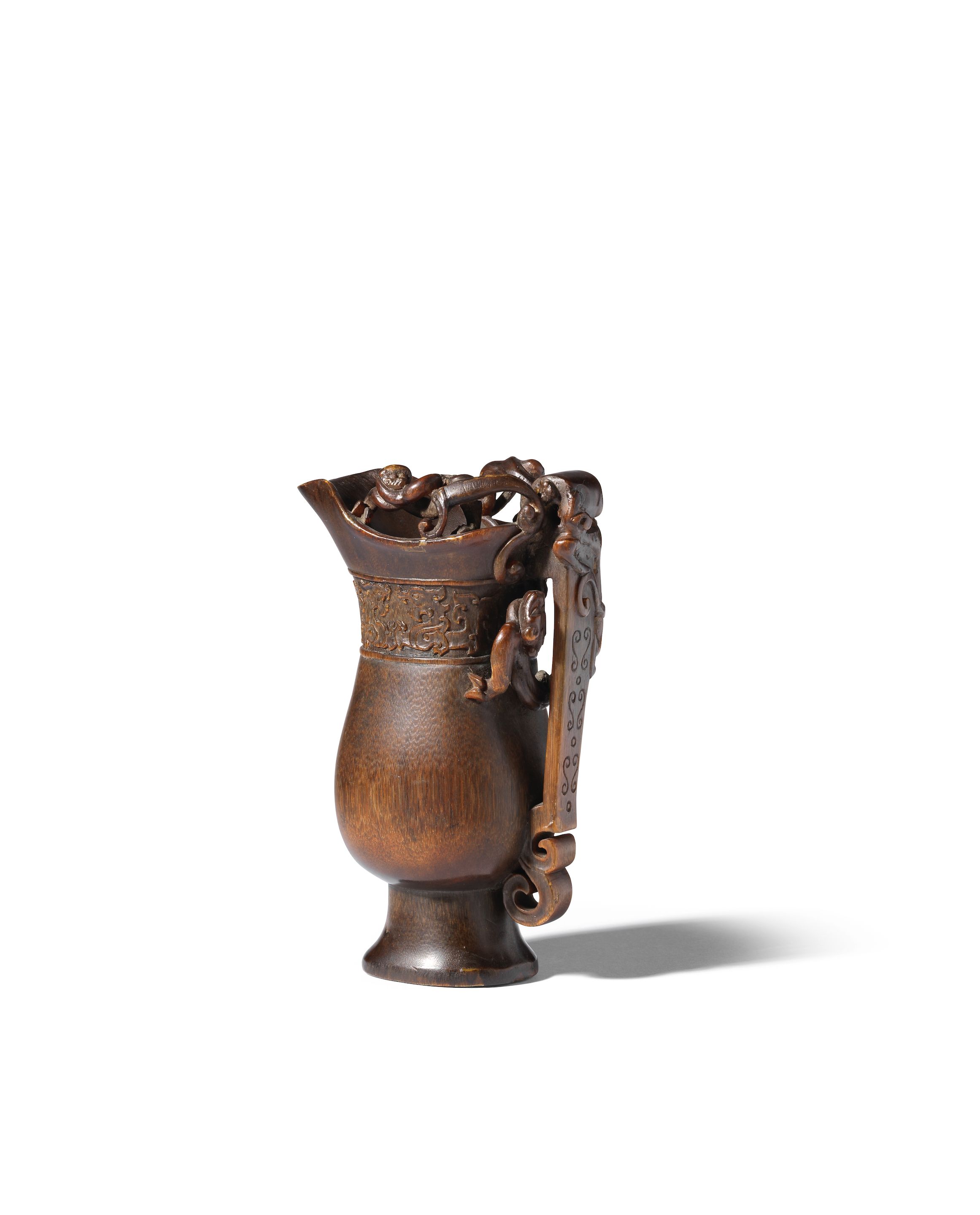 Bonhams : An archaistic rhinoceros horn rhyton cup 17th/18th century