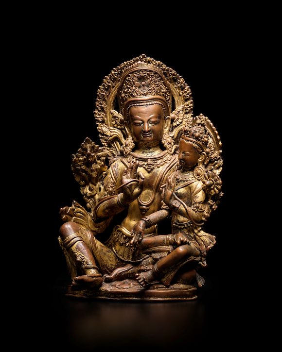 Bonhams : A GILT COPPER FIGURE OF INDRA AND INDRANI NEPAL, 17TH CENTURY