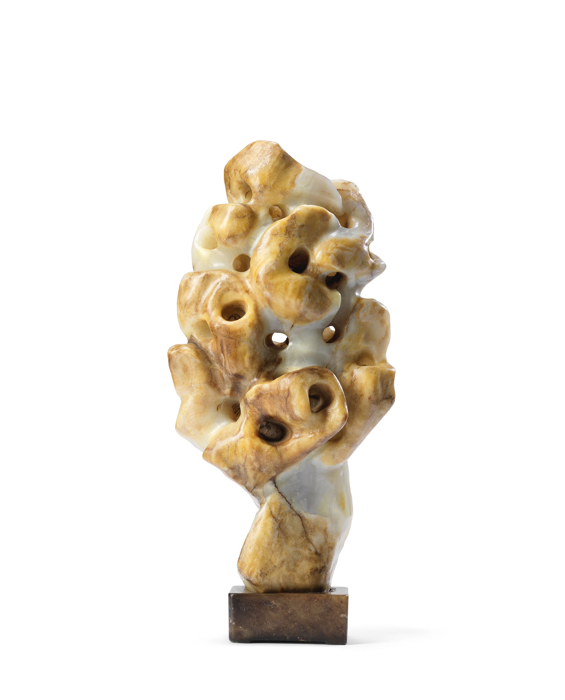 Bonhams : A rare pale green and russet jade scholar's rock Ming Dynasty (2)