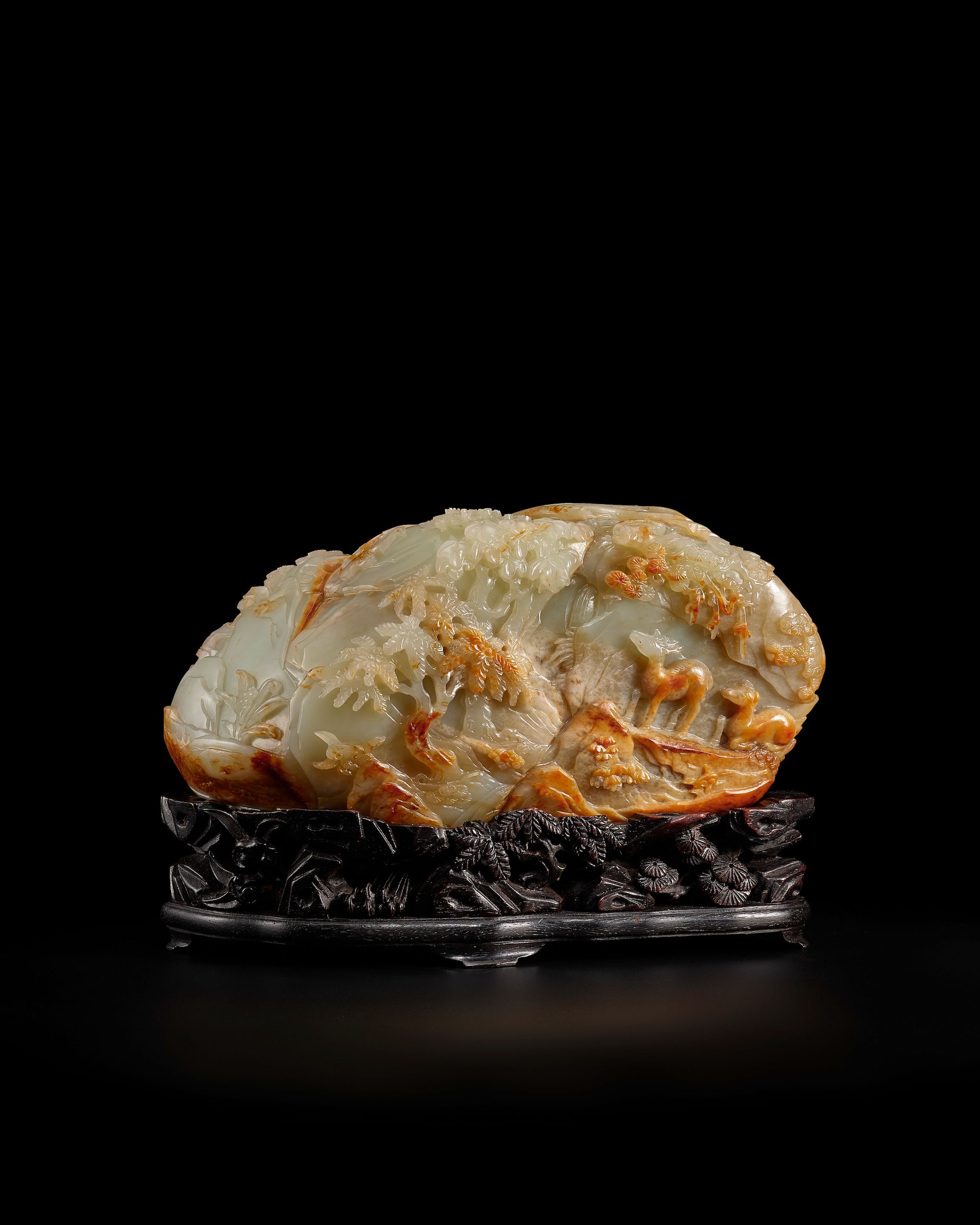 Bonhams : A very rare and large pale green and russet jade 'longevity ...