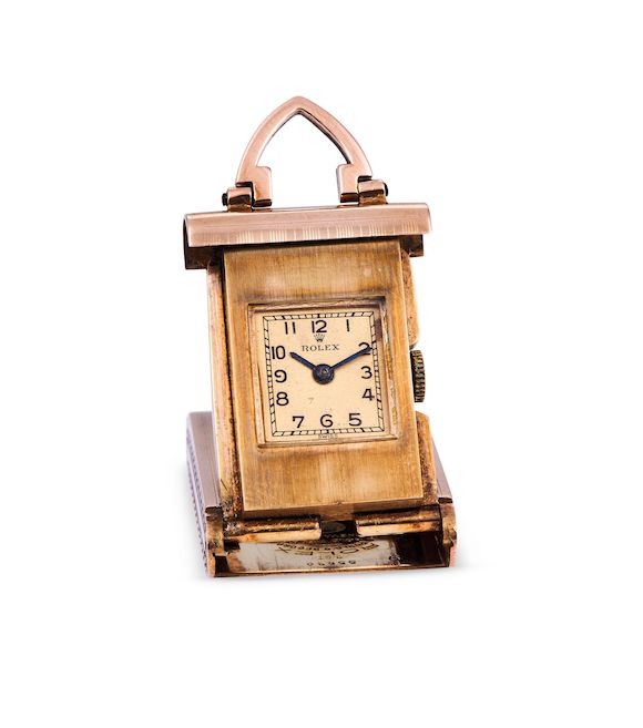 Bonhams : Rolex. A 9K Pink Gold Concealed Purse Watch