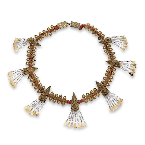 Bonhams : A KARO-BATAK GILT SILVER HEADDRESS ORNAMENT, SERTALI RUMAH ...