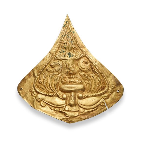 Bonhams : A REPOUSSÉ GOLD PLAQUE WITH KALA FACE JAVA, INDONESIA, 10TH ...