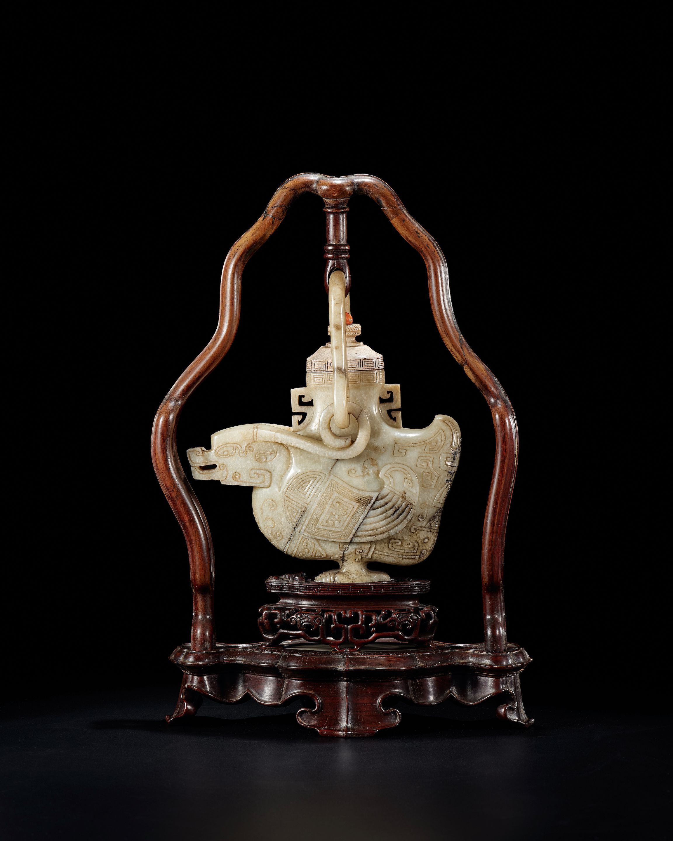 Bonhams : A rare archaistic 'burnt' jade duck-shaped vase and cover ...