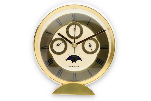 Bonhams : Movado. A Table Clock, With box and warrenty card
