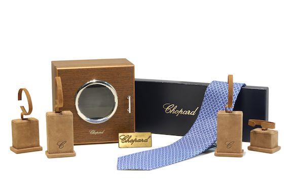 Bonhams : Chopard Winder and Charger box (1 piece), Tie and 4 Watch Stand