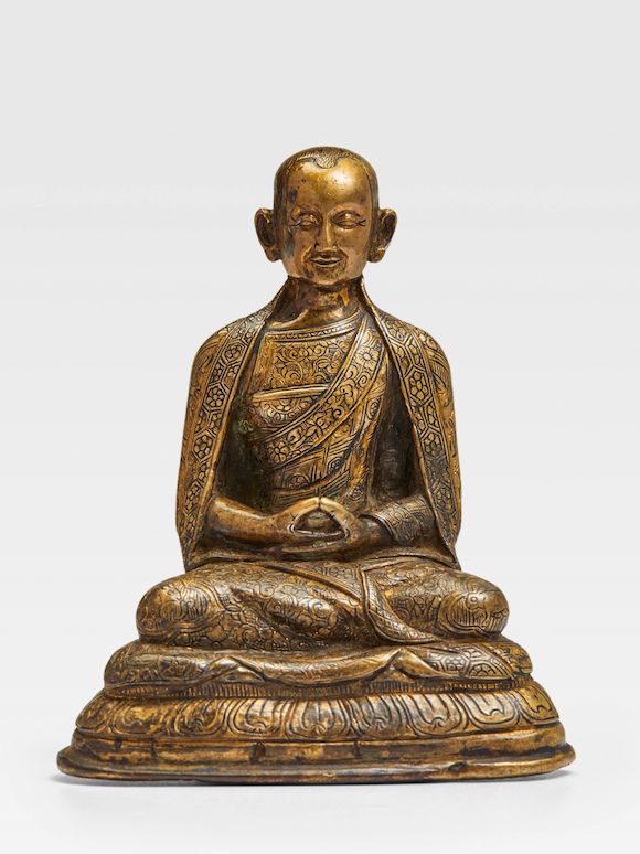Bonhams : A COPPER ALLOY FIGURE OF SENGGE GYALTSEN TIBET, 14TH/15TH CENTURY