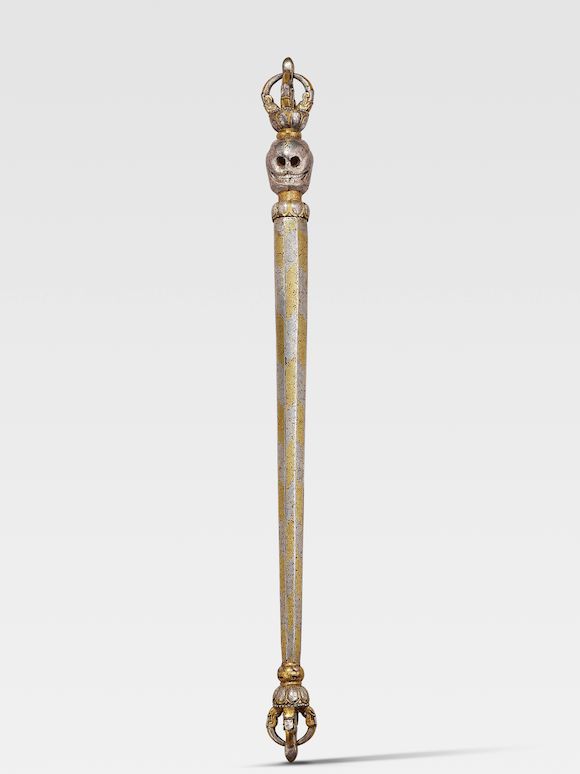 Bonhams : A GOLD AND SILVER DAMASCENED IRON KAPALA DANDA DERGE, EASTERN ...