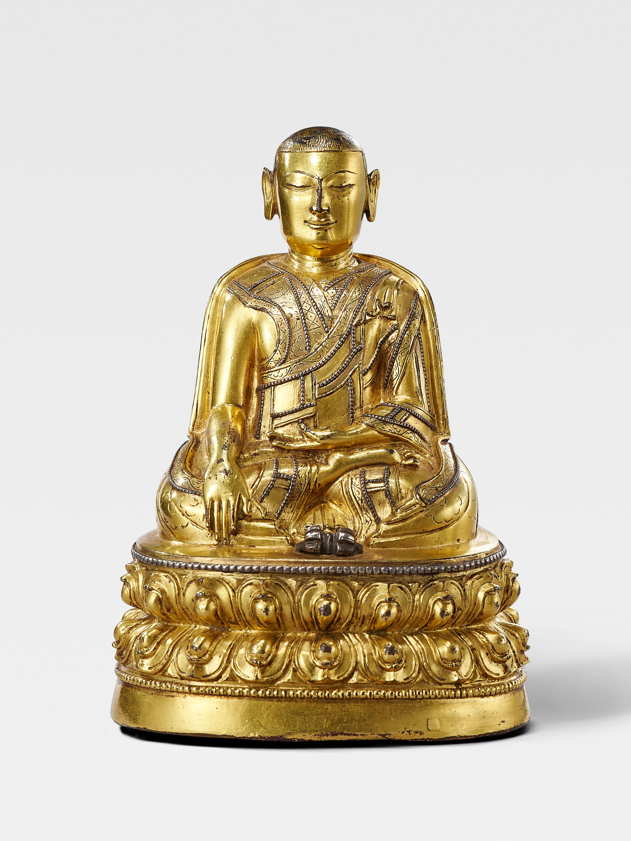 Bonhams A Silver Inlaid Gilt Copper Alloy Figure Of A Taklung Kagyu