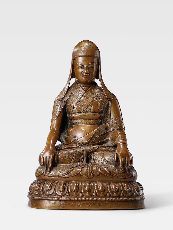 Bonhams : A SILVER INLAID BRASS ALLOY FIGURE OF ZANGPO GYELTSEN TIBET ...
