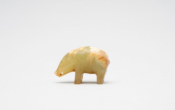 Bonhams : A green jade boar