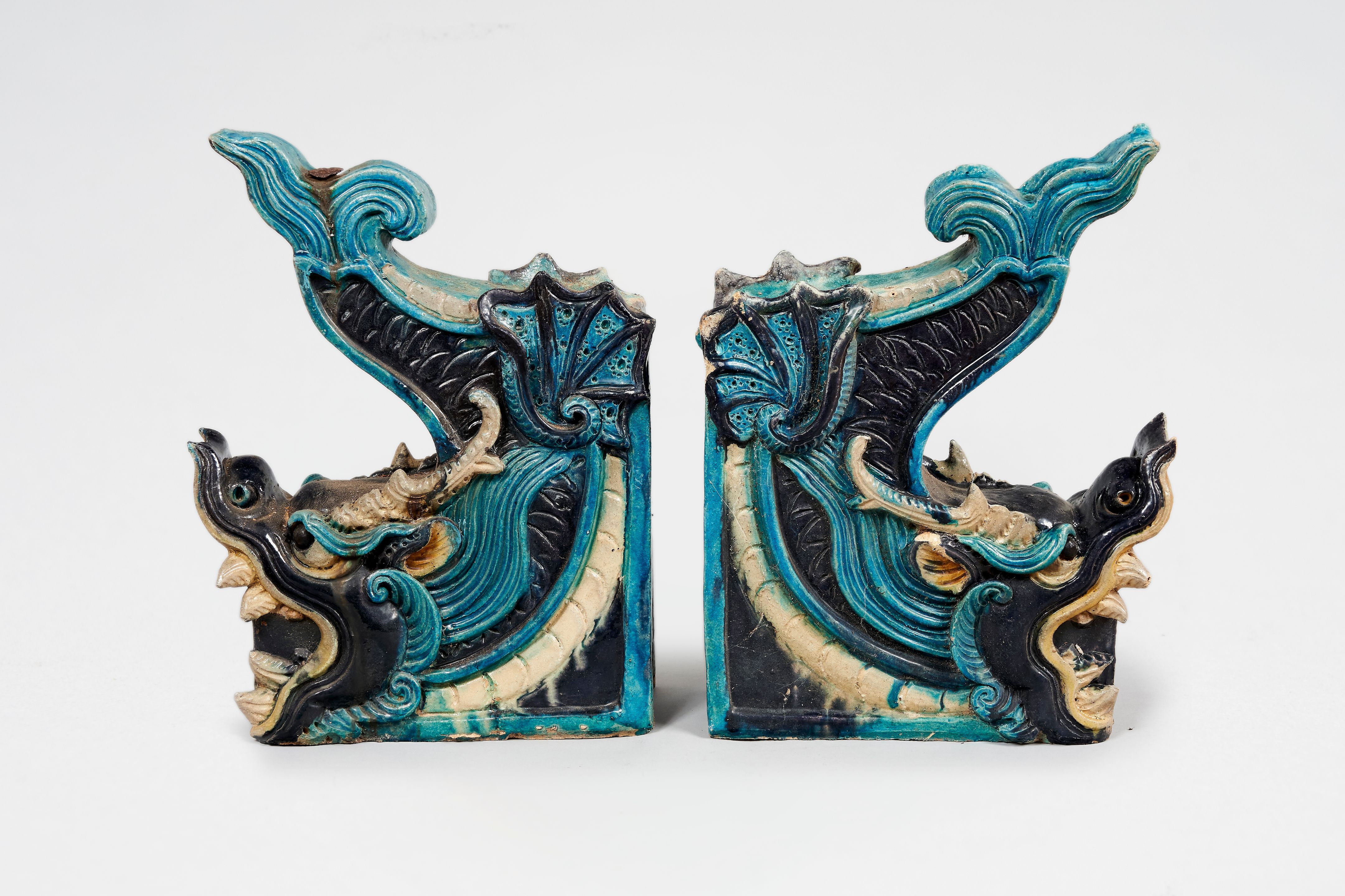 Bonhams : A pair of turquoise and aubergine glazed pottery chiwen roof ...