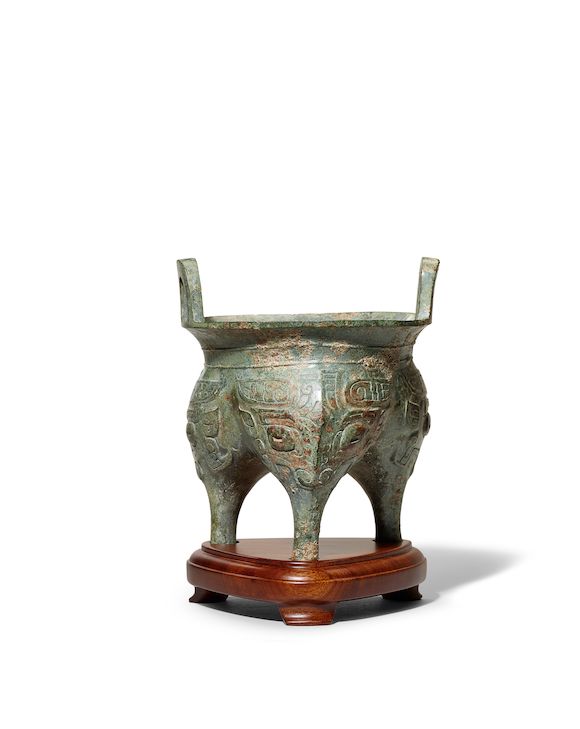Bonhams : A rare archaic bronze ritual tripod food vessel, liding Late ...