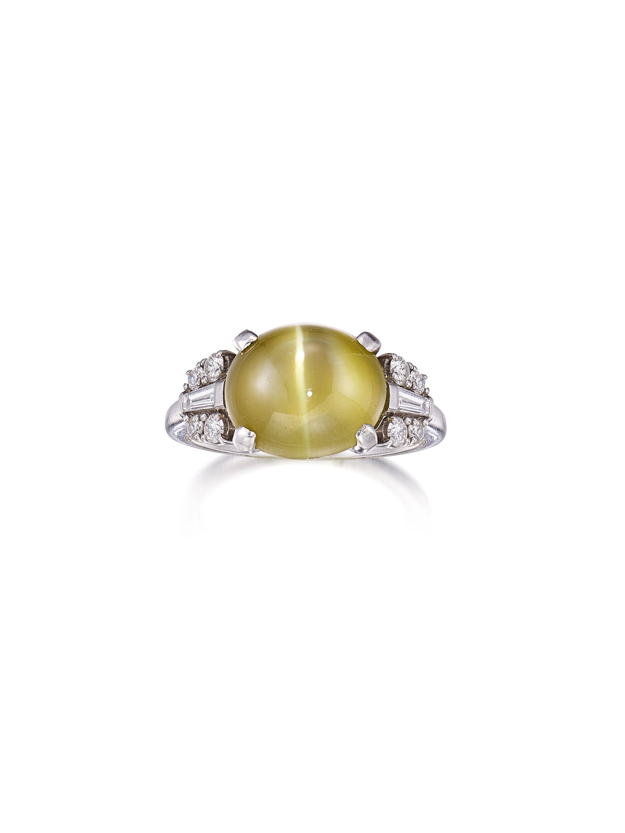 Bonhams : A CAT'S EYE CHRYSOBERYL AND DIAMOND RING,