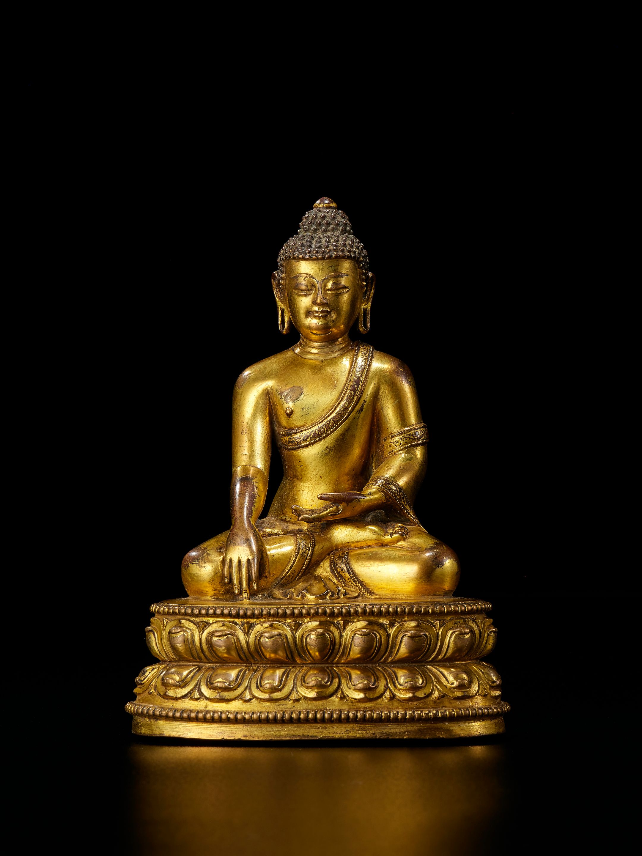 Bonhams : A GILT COPPER ALLOY FIGURE OF SHAKYAMUNI BUDDHA YUAN DYNASTY ...