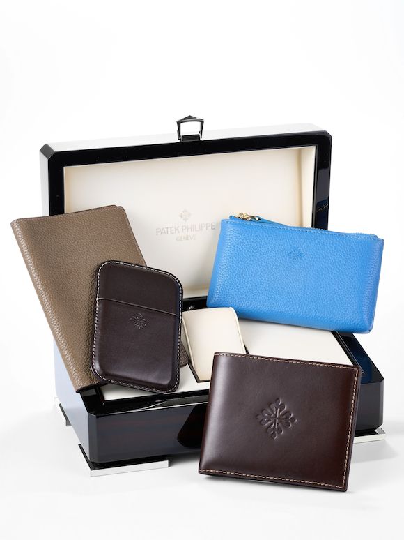 Bonhams : PATEK PHILIPPE | GROUP OF 5: A WATCH PRESENTATION BOX, A ...