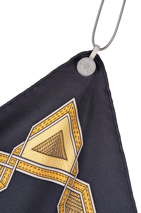 Bonhams : HERMÈS BLACK SILK SCARF WITH MAGNETIC HANGING SYSTEM ...