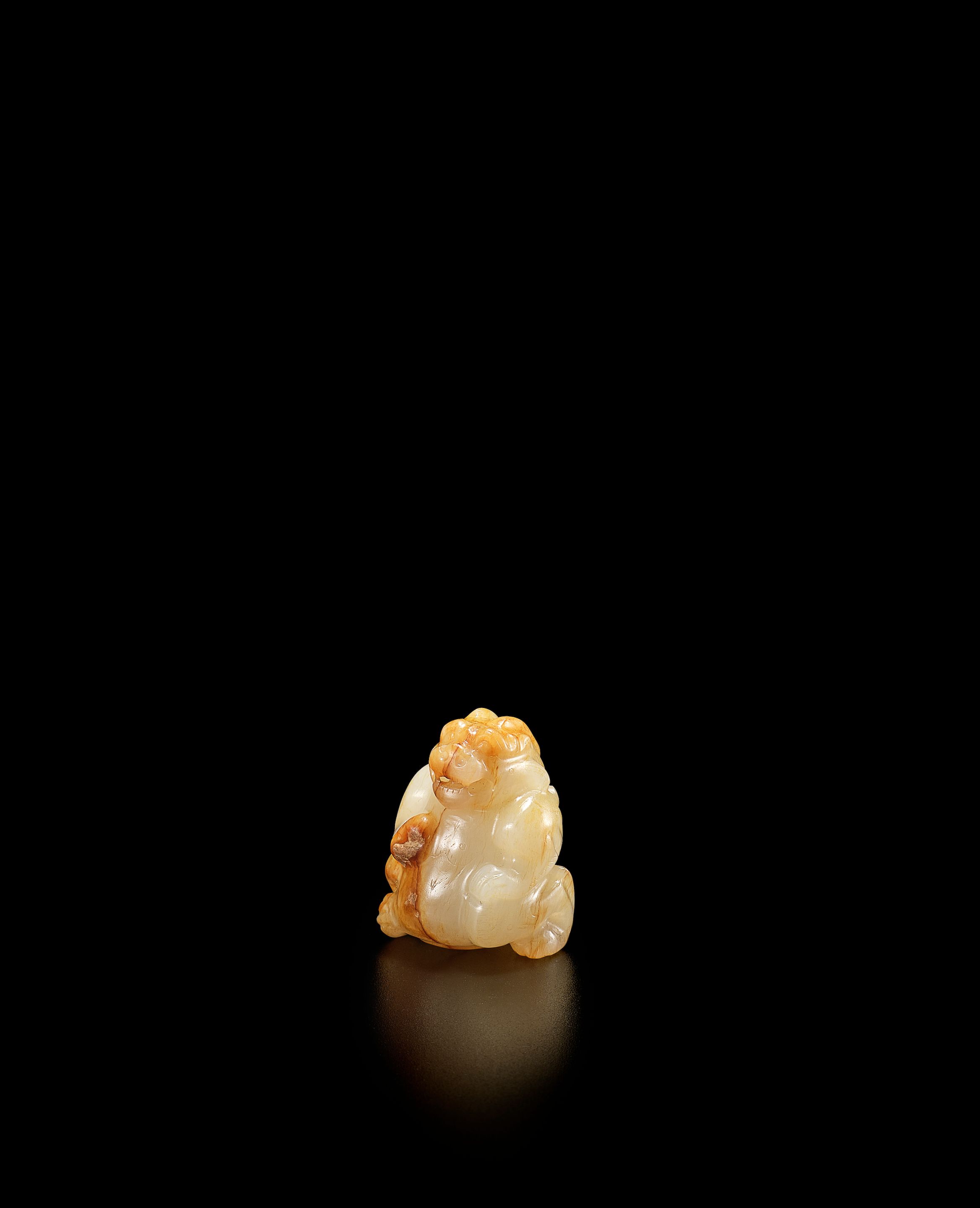 Bonhams : A WHITE AND RUSSET JADE CARVED MYTHICAL BEAST, BIXIE Han ...
