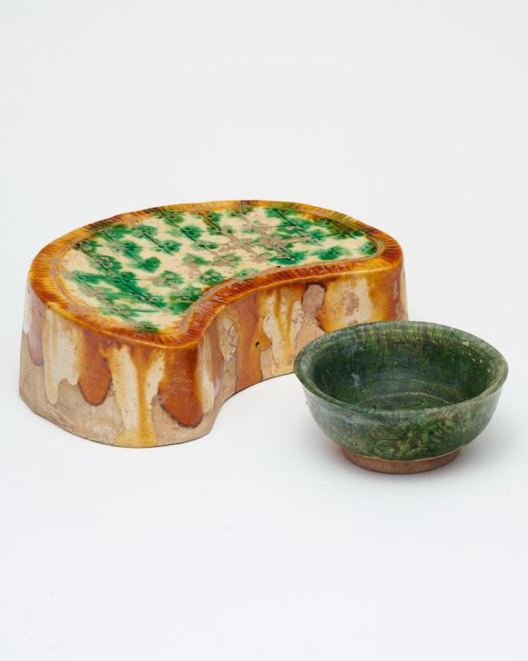 Bonhams : A sancai-glazed kidney-shaped pillow and a green-glazed ...