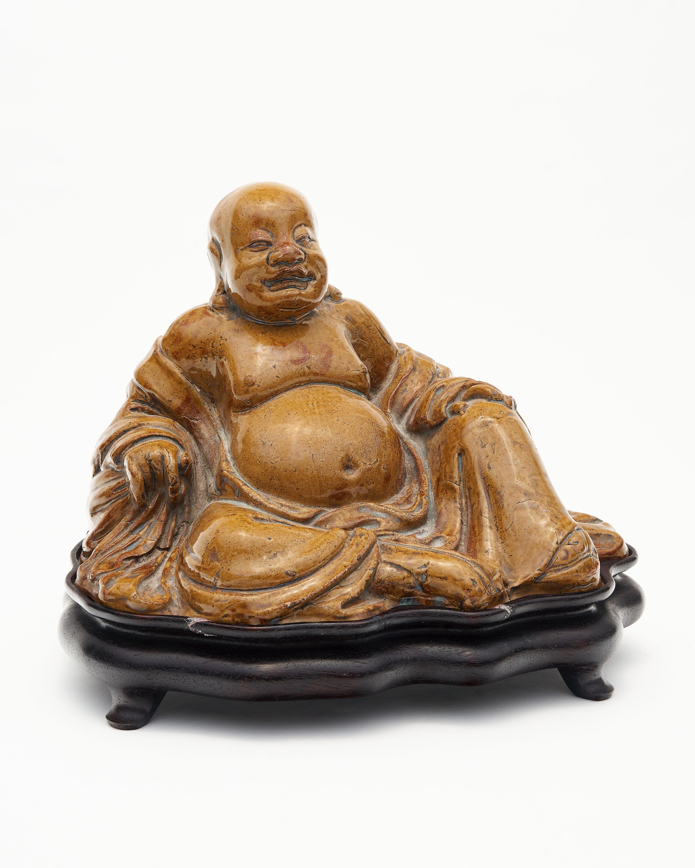 Bonhams : A shiwan-ware yellow glazed figure of Buddha 19th/20th century