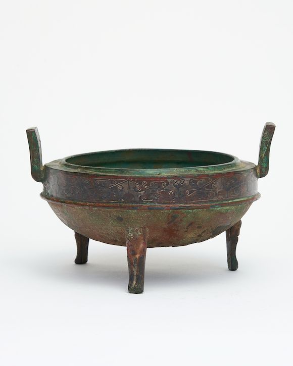 Bonhams : A bronze tripod 'bear foot' censer with silver inlays Warring ...