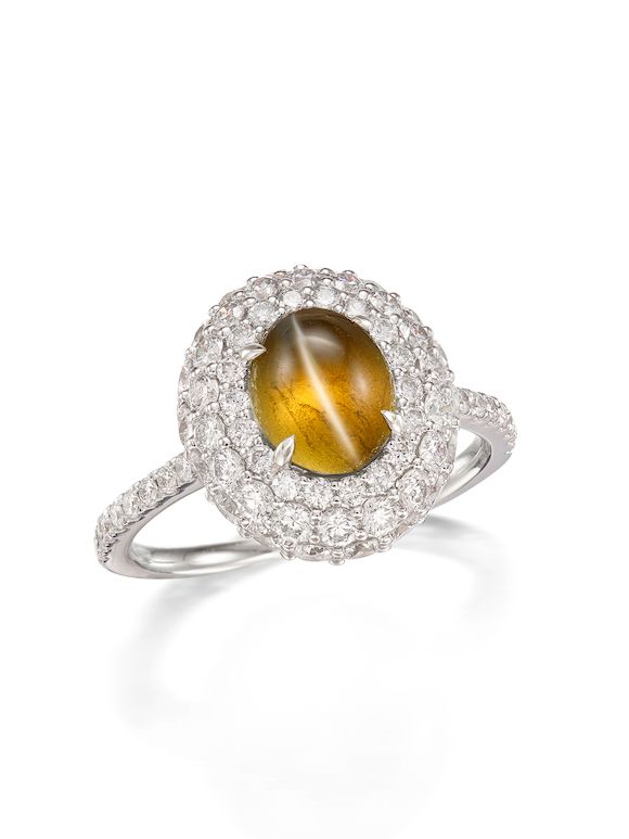 Bonhams : CAT'S EYE CHRYSOBERYL AND DIAMOND RING