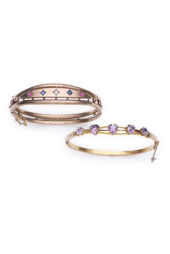 Bonhams : TWO 9CT GOLD HINGED BANGLES