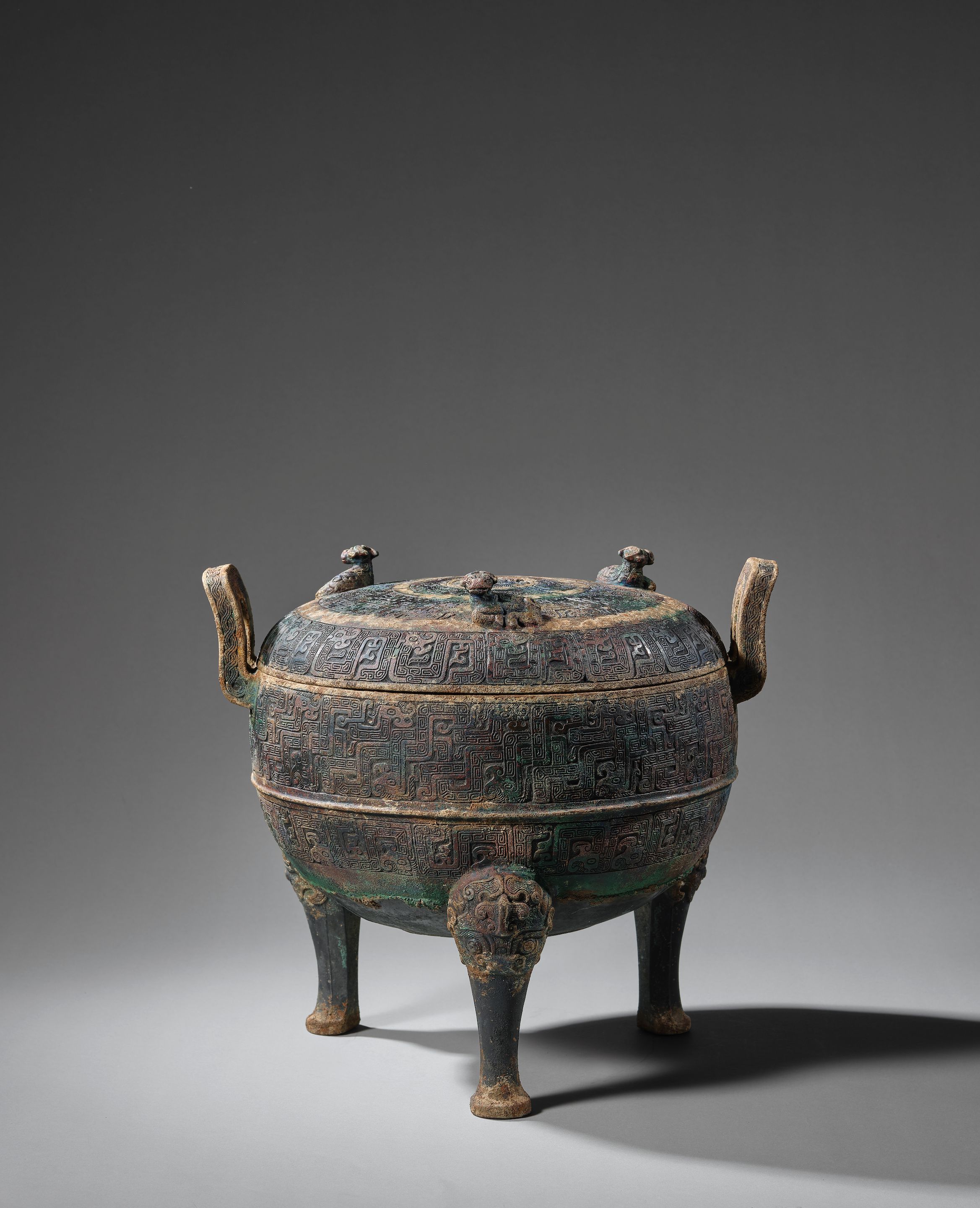 Bonhams : AN ARCHAIC BRONZE RITUAL VESSEL AND COVER, DING Eastern Zhou ...