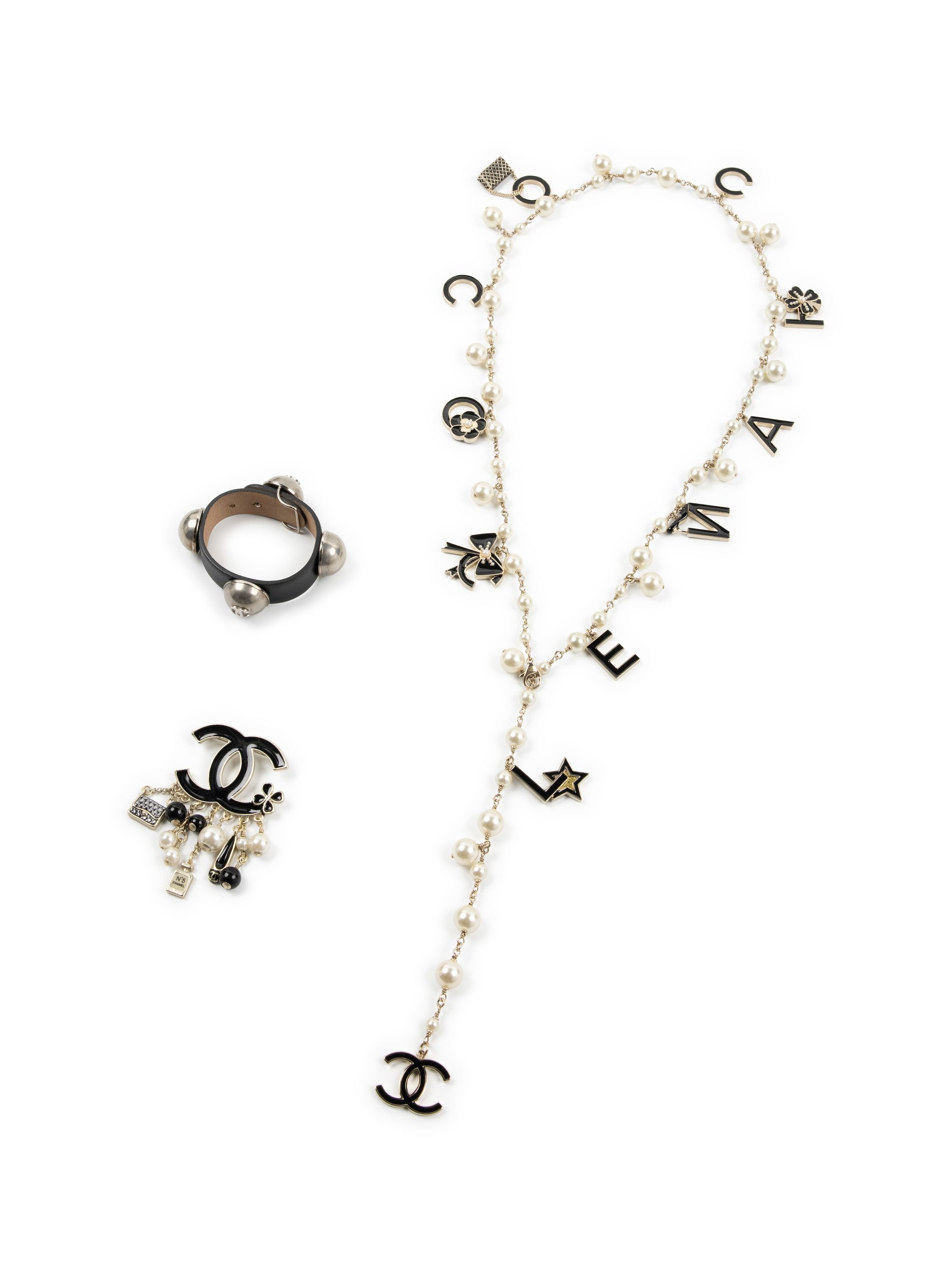 Bonhams : CHANEL 'COCO' 'CHANEL' LETTERS BLACK WHITE GOLD COLOURED ...