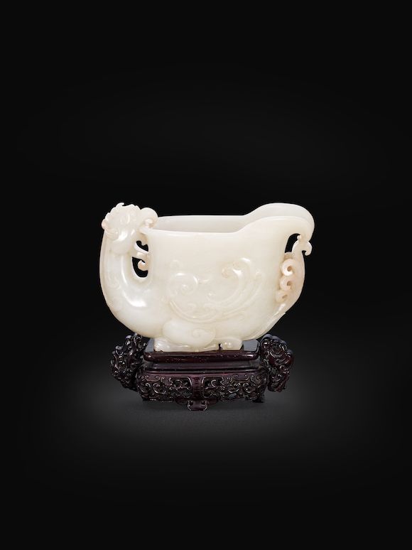Bonhams : A WHITE JADE 'PHOENIX' VESSEL, GONG 18th/19th century (3)
