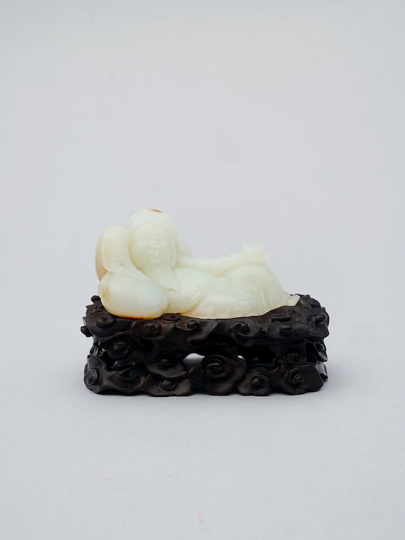 Bonhams : A white jade figure of Li Bai 20th century