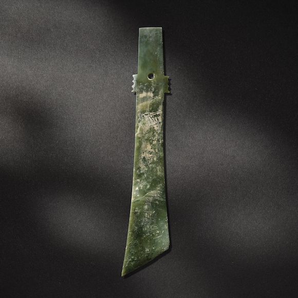 Bonhams : A LARGE ARCHAIC PALE GREEN JADE BLADE, ZHANG Neolithic Period ...