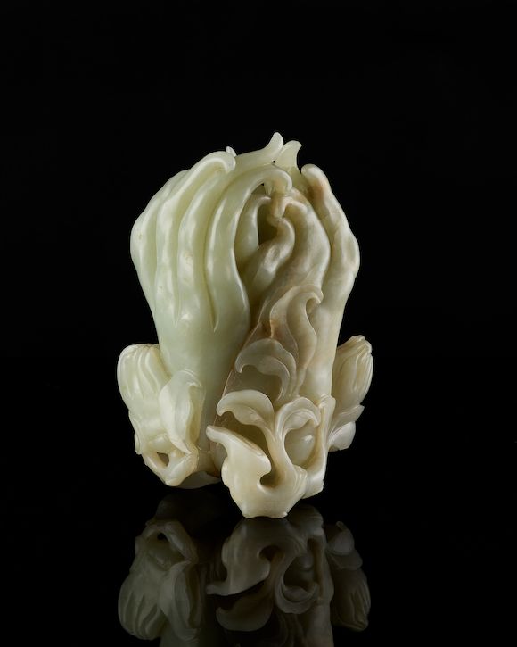 Bonhams : A PALE GREEN JADE CARVING OF A FINGER CITRON Qing Dynasty