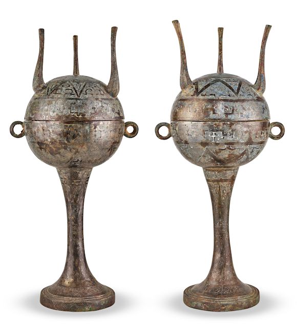 Bonhams : A PAIR OF ARCHAIC BRONZE RITUAL VESSELS AND COVERS, DUN ...