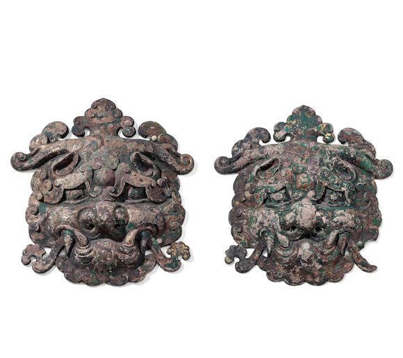 Bonhams : A PAIR OF ARCHAIC BRONZE 'MYTHICAL BEAST' MASKS Tang Dynasty (2)