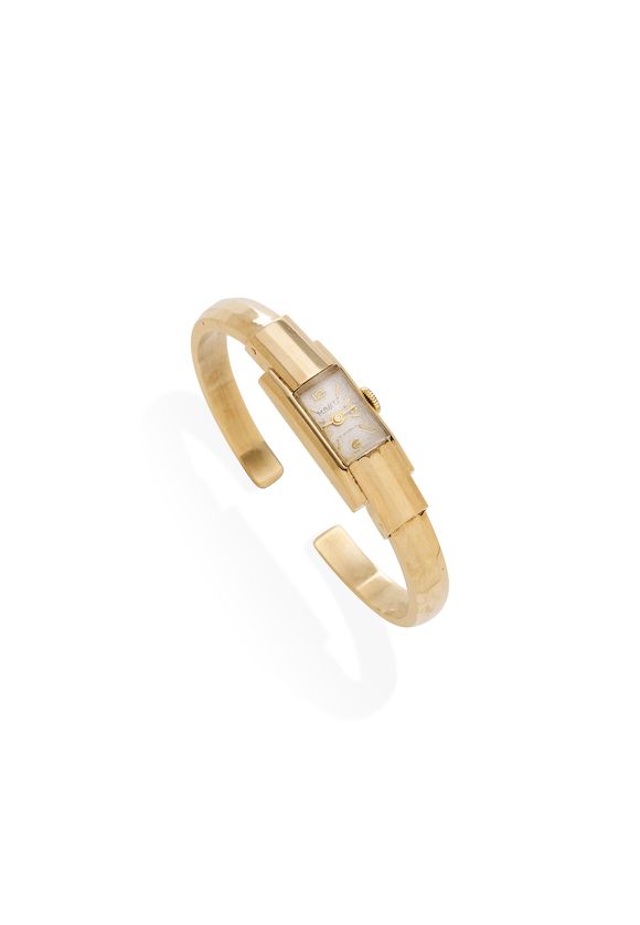Bonhams : MARTI 14CT GOLD HINGED CUFF WATCH