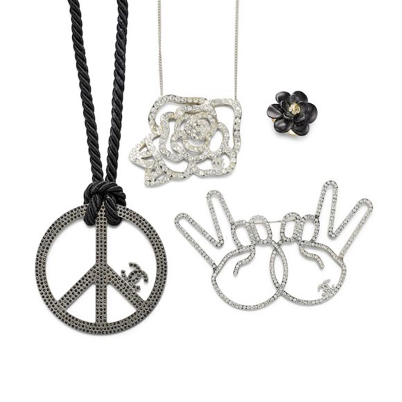 Bonhams : CHANEL: A SET OF 4 BLACK PEACE & LOVE RHISTONE NECKLACE ...