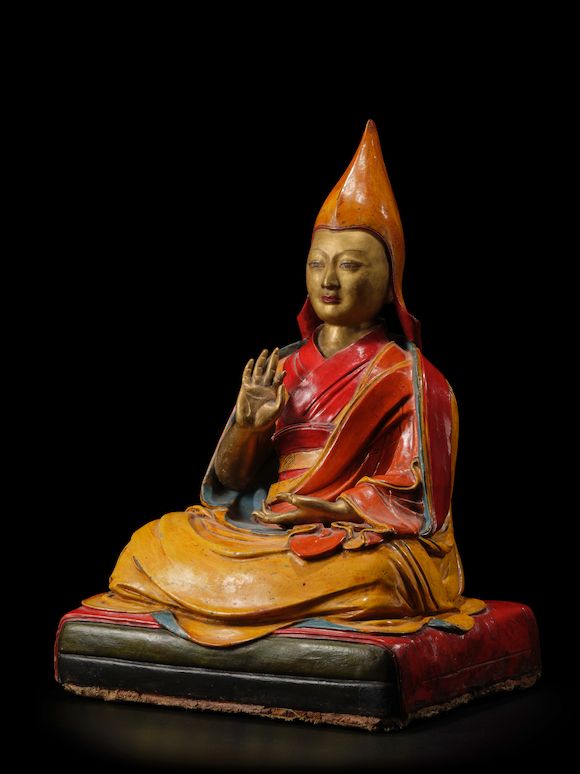 Bonhams : A POLYCHROMED LACQUERED CLAY FIGURE OF A SAKYA LAMA TIBET ...