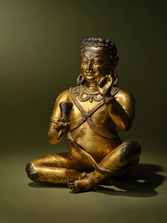Bonhams : A GILT COPPER ALLOY FIGURE OF A MAHASIDDHA, PROBABLY PADAMPA ...