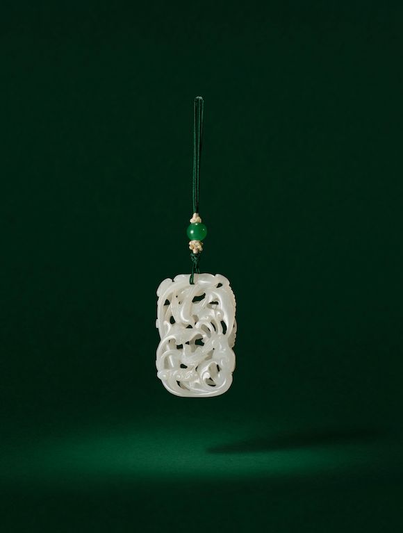 Bonhams : A VERY FINE WHITE JADE 'BIRDS AND LINGZHI' OPENWORK PENDANT ...