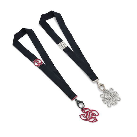 Bonhams : CHANEL: A SET OF 2 BLACK AND SILVER TONED CRYSTAL CC LANYARD ...