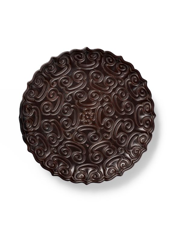 Bonhams : A BLACK TIXI LACQUER TWELVE-LOBED DISH Ming Dynasty, 15th ...