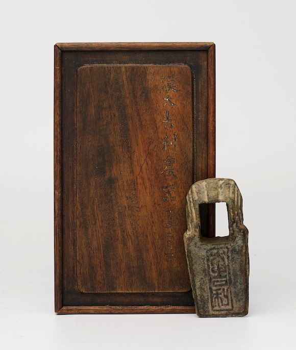 Bonhams : A bronze agricultural tool Han dynasty