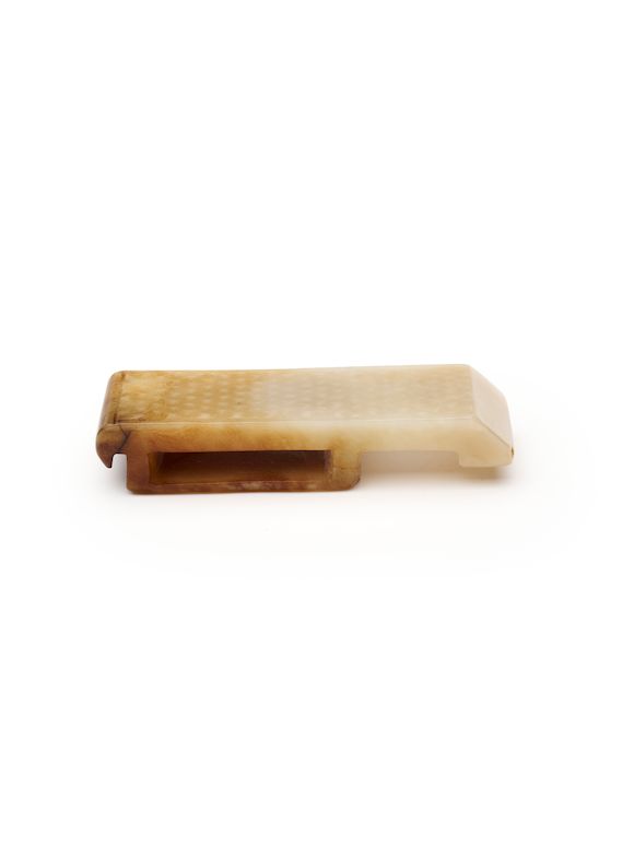 Bonhams : A celadon jade sword slide, zhi Style of Han dynasty