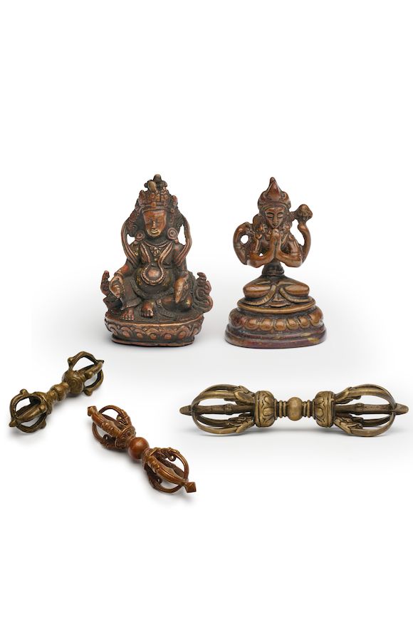 Bonhams : Three copper alloy vajra, and two copper alloy figure of ...